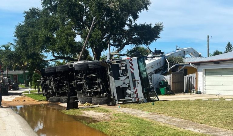 'Trashed': Crane falls onto Merritt Island house as homeowner watches ...