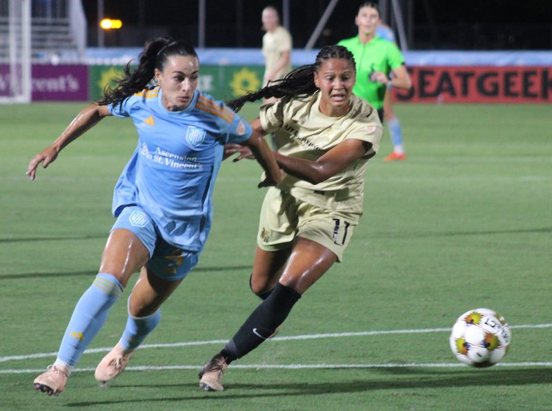 How young? Rhea Moore scores milestone women's soccer goal to beat ...