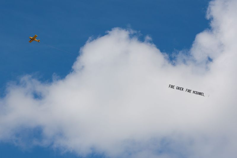 Banner flying over Dolphins' home opener calls for Mike McDaniel, Chris ...