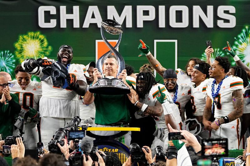 Oregon, Miami arrive in CFP years after messy Mario Cristobal divorce