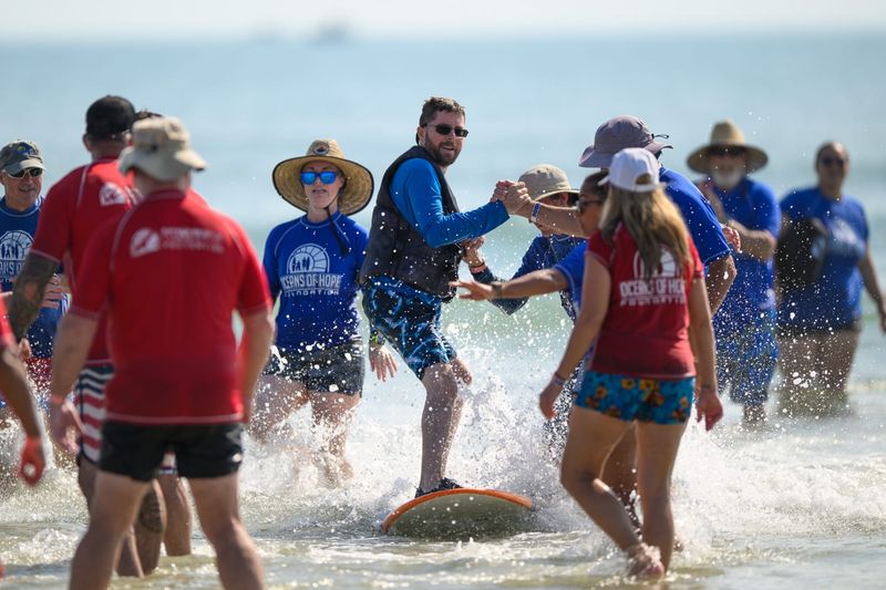 How to lift injured veterans' spirits? Surf New Smyrna Beach