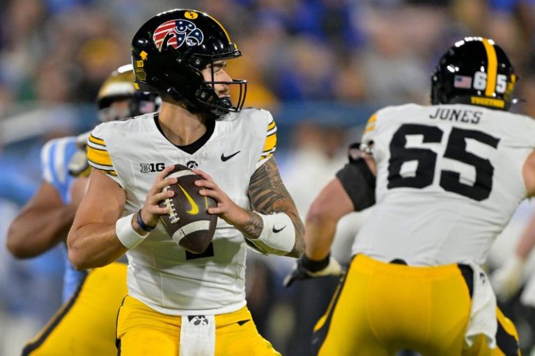 Former Iowa football QB entrenched in position battle after big ...