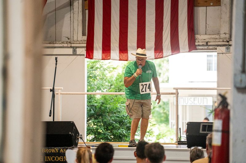 How does one bring home the bacon in hog calling at the Iowa State Fair?