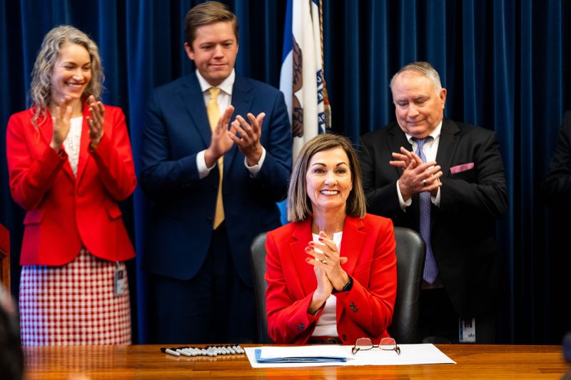 How many days does Iowa Gov. Kim Reynolds have to sign bills?