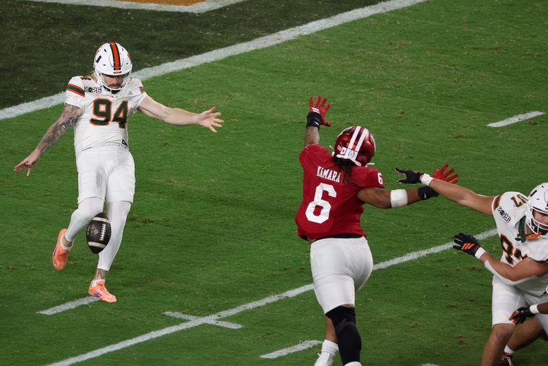 Watch: Indiana blocks Miami punt for touchdown in national championship ...