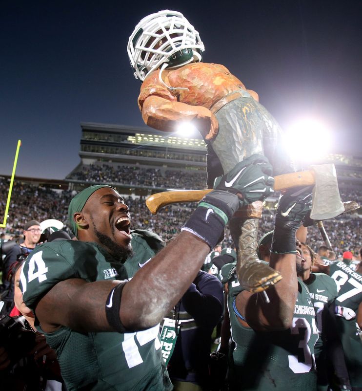 Michigan football vs Michigan State football predictions: Who takes ...