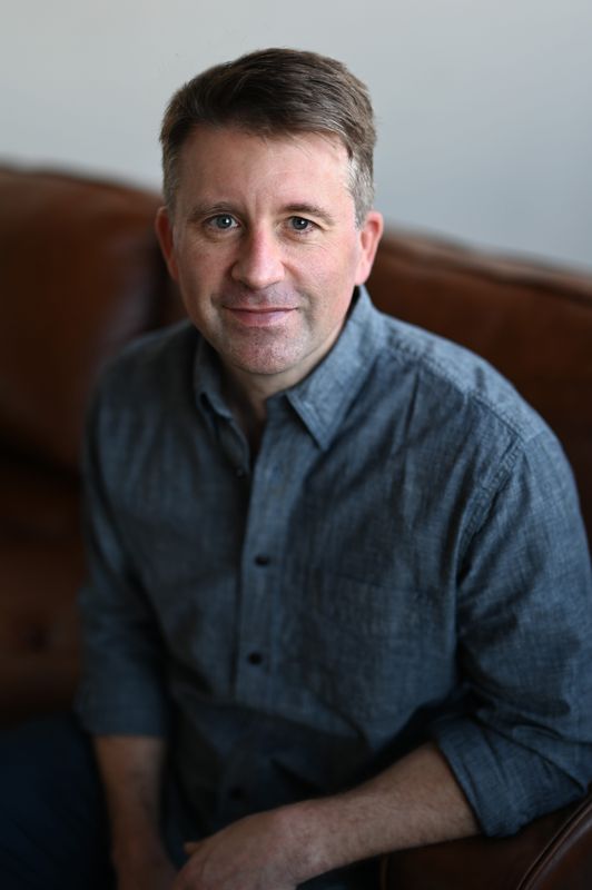 Josh Cowen, East Lansing resident and Michigan State professor, enters ...