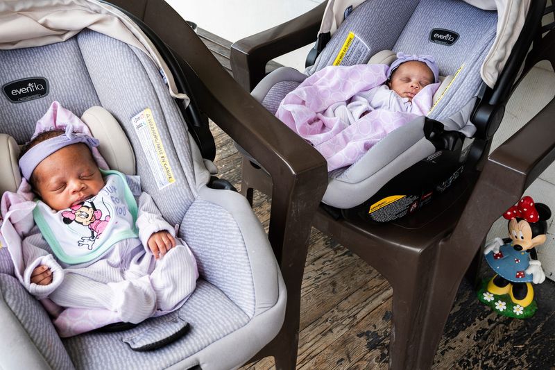 Detroit EMTs reunite with twin girls delivered during emergency home birth