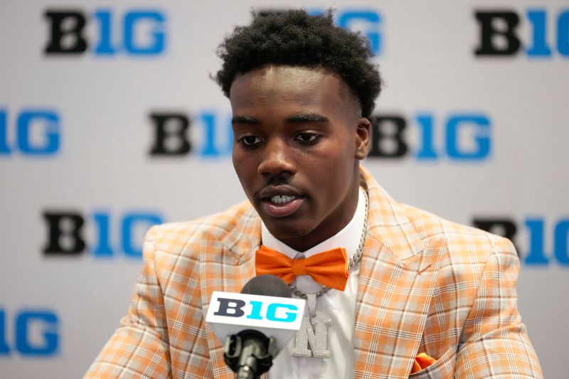 Nick Marsh took less money to stay at Michigan State. Is something ...
