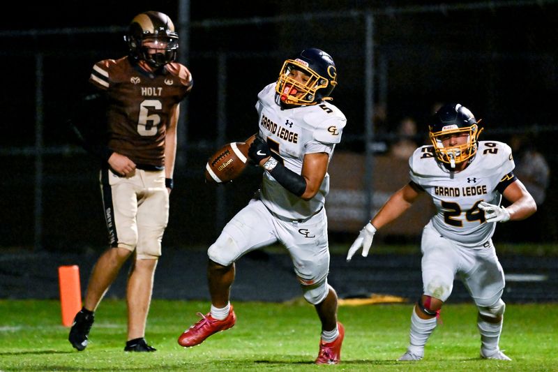 Anthony Baker delivers for Grand Ledge football in comeback victory ...
