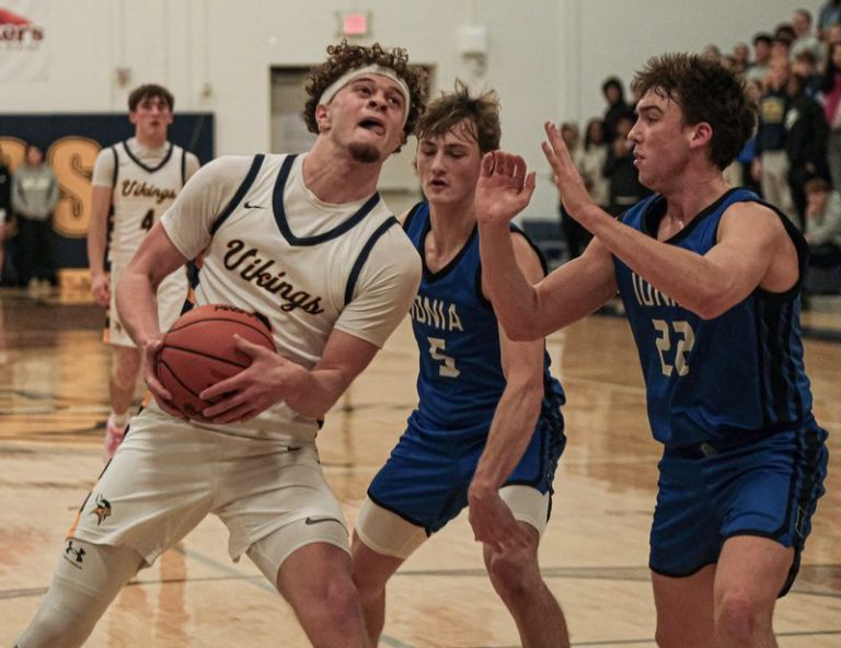 Travis Satterla's big second half powers Haslett basketball to opening win