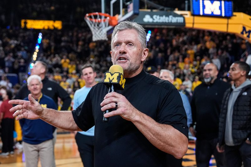 Kyle Whittingham, Michigan football coach gets standing O at Crisler
