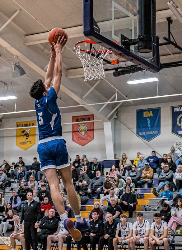 Adrian holds off Onsted in battle of top 10 teams in the state