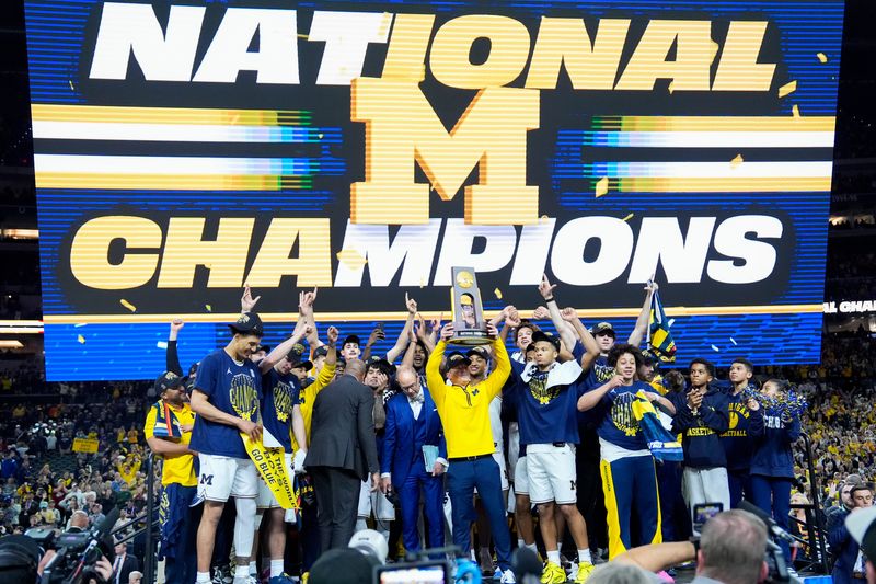 Michigan inevitable in march past UConn for 2nd NCAA championship 69-63