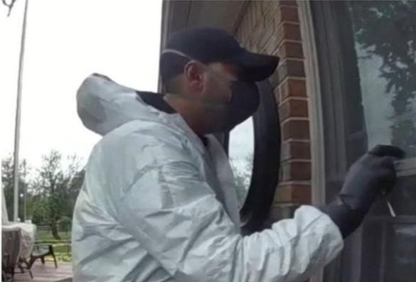 Livonia man accused of breaking into homes wearing hazmat suit charged