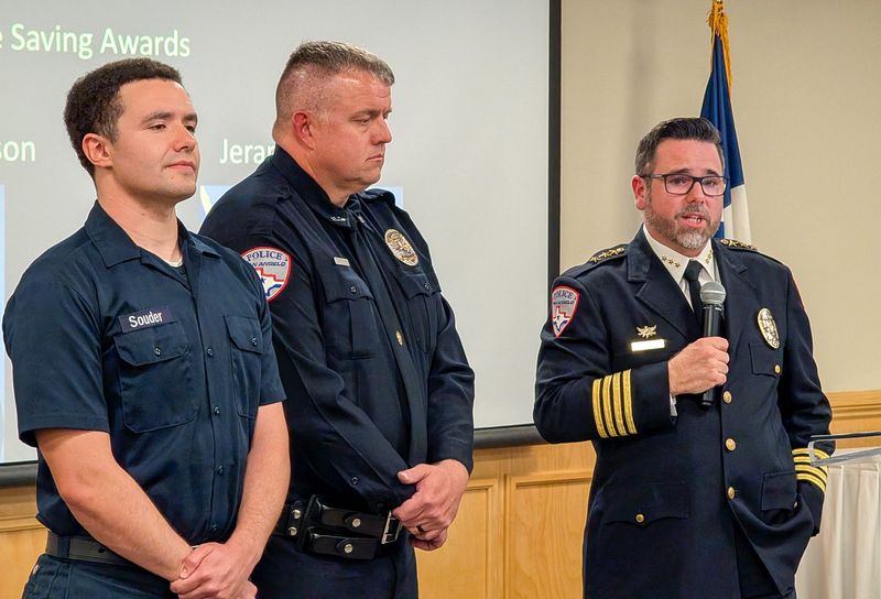 San Angelo police dispatcher, officer recognized for saving child