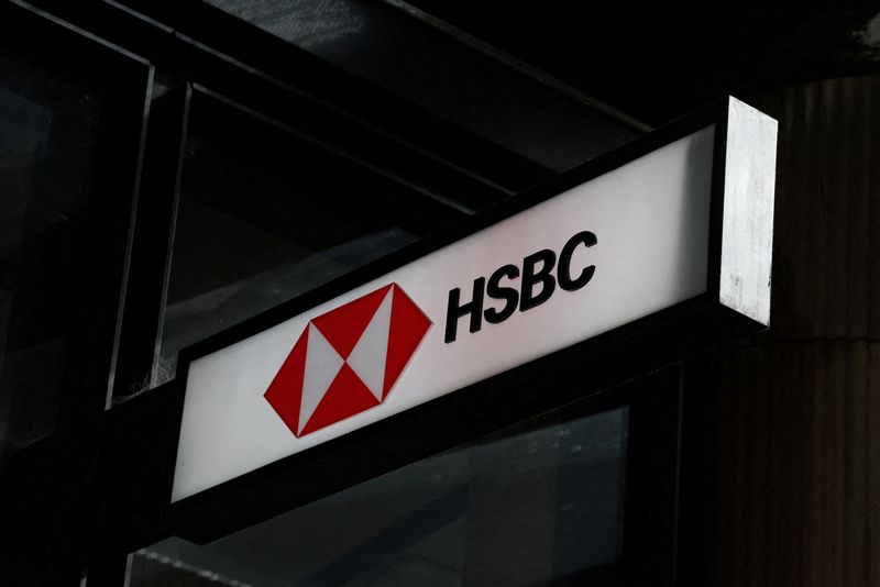 HSBC lifts income outlook, though Madoff lawsuit charges mar profit