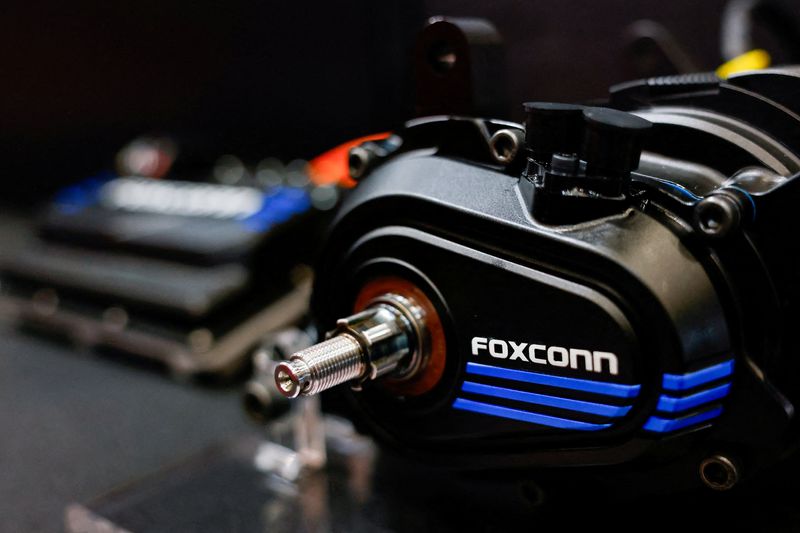Foxconn to spend up to $3 billion a year on AI, chair sees China EV ...