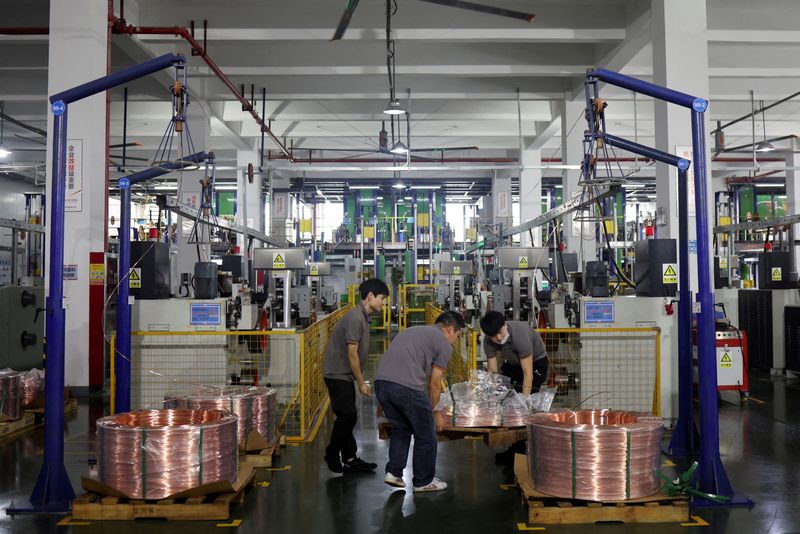 China's factory activity expected to shrink for ninth month: Reuters poll