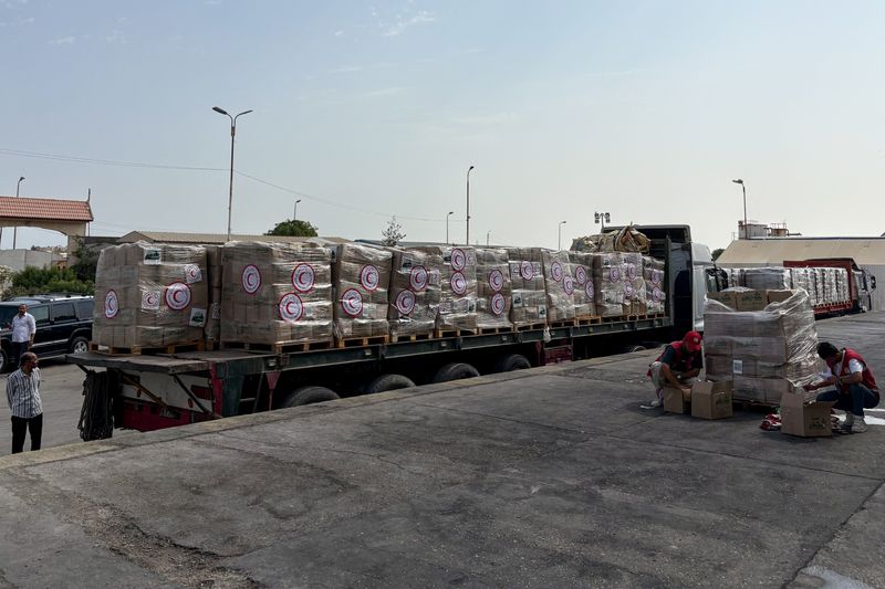 Turned back from Gaza, aid shipments languish in warehouses, on roadsides