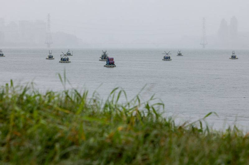 Taiwan stays on high alert as Chinese ships pull back after massive drills