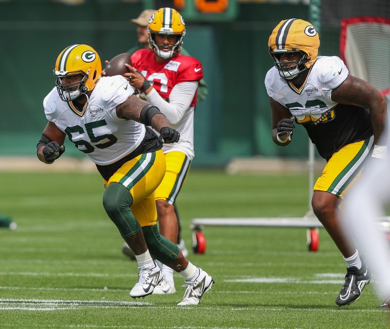 Packers starting offensive linemen Aaron Banks and Zach Tom among four ...